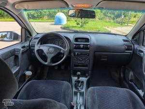 White Opel Astra 1998 in Klaipeda, with an engine capacity of 1.60 L and mileage of 236 thousand km for 850 €, photo 9 on AUTOMOTO.COM.LV