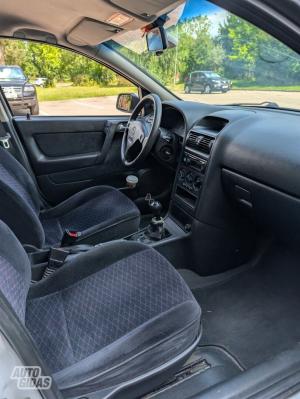 White Opel Astra 1998 in Klaipeda, with an engine capacity of 1.60 L and mileage of 236 thousand km for 850 €, photo 10 on AUTOMOTO.COM.LV
