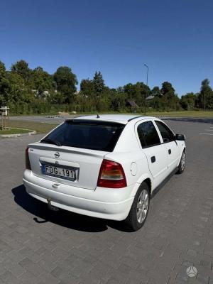 White Opel Astra 2001 in Kaunas, with an engine capacity of 2.00 L and mileage of 210 thousand km for 660 €, photo 8 on AUTOMOTO.COM.LV