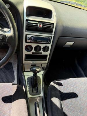 White Opel Astra 2001 in Kaunas, with an engine capacity of 2.00 L and mileage of 210 thousand km for 660 €, photo 18 on AUTOMOTO.COM.LV