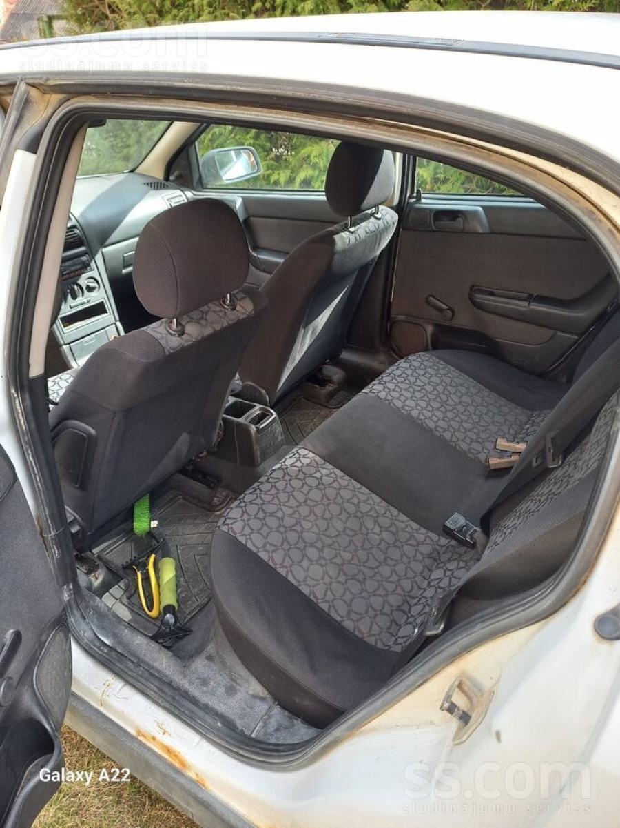 Balts Opel Astra 2005 Rīga, ar dzinēja tilpumu 1.40 L un nobraukumu 425 tūkst. km par 400 €, foto 7 vietnē AUTOMOTO.COM.LV