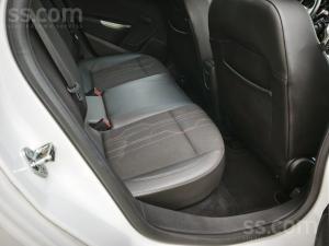 White Opel Astra 2013 in Riga, with an engine capacity of 1.40 L and mileage of 156 thousand km for 5900 €, photo 9 on AUTOMOTO.COM.LV