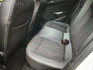 White Opel Astra 2013 in Riga, with an engine capacity of 1.40 L and mileage of 156 thousand km for 5900 €, photo 11 on AUTOMOTO.COM.LV