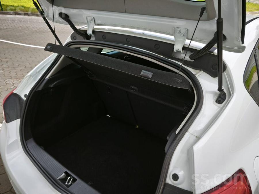 White Opel Astra 2013 in Riga, with an engine capacity of 1.40 L and mileage of 156 thousand km for 5900 €, photo 22 on AUTOMOTO.COM.LV