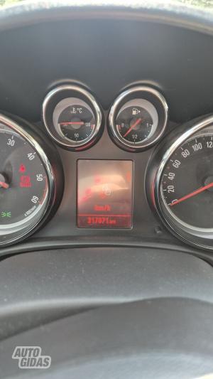 White Opel Astra 2013 in Silute, with an engine capacity of 1.70 L and mileage of 318 thousand km for 3500 €, photo 11 on AUTOMOTO.COM.LV