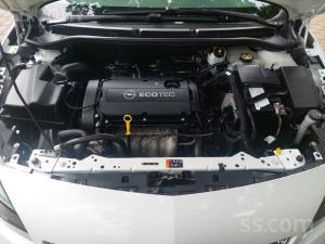 White Opel Astra 2014 in Cesis, with an engine capacity of 1.60 L and mileage of 230 thousand km for 5200 €, photo 14 on AUTOMOTO.COM.LV