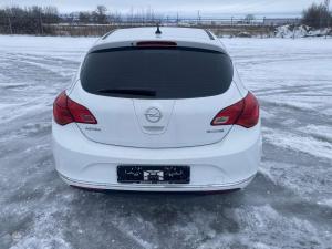 White Opel Astra 2015 in Marijampole, with an engine capacity of 1.40 L and mileage of 168 thousand km for 4550 €, photo 7 on AUTOMOTO.COM.LV