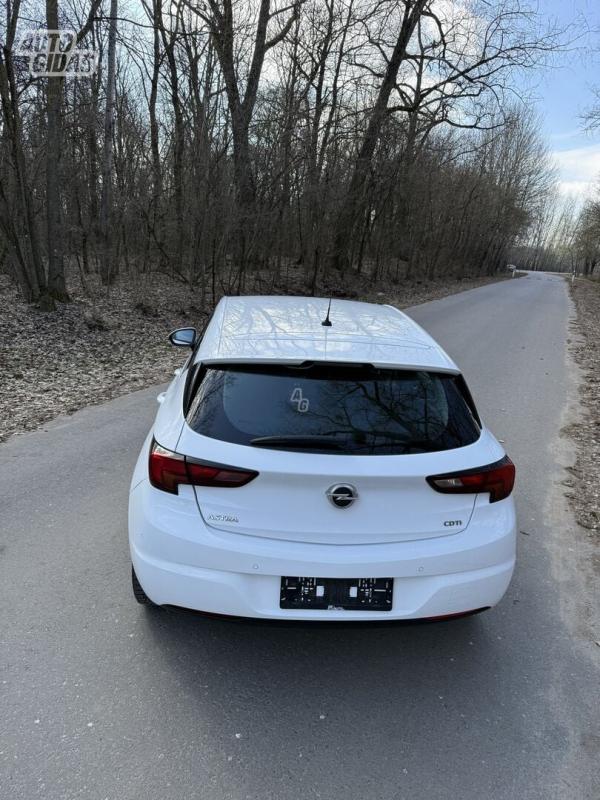 White Opel Astra 2016 in Kaunas, with an engine capacity of 1.60 L and mileage of 261 thousand km for 6950 €, photo 6 on AUTOMOTO.COM.LV
