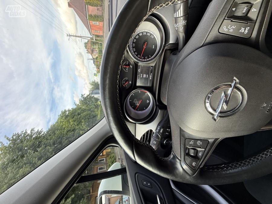 White Opel Astra 2016 in Kaunas, with an engine capacity of 1.60 L and mileage of 266 thousand km for 6700 €, photo 26 on AUTOMOTO.COM.LV
