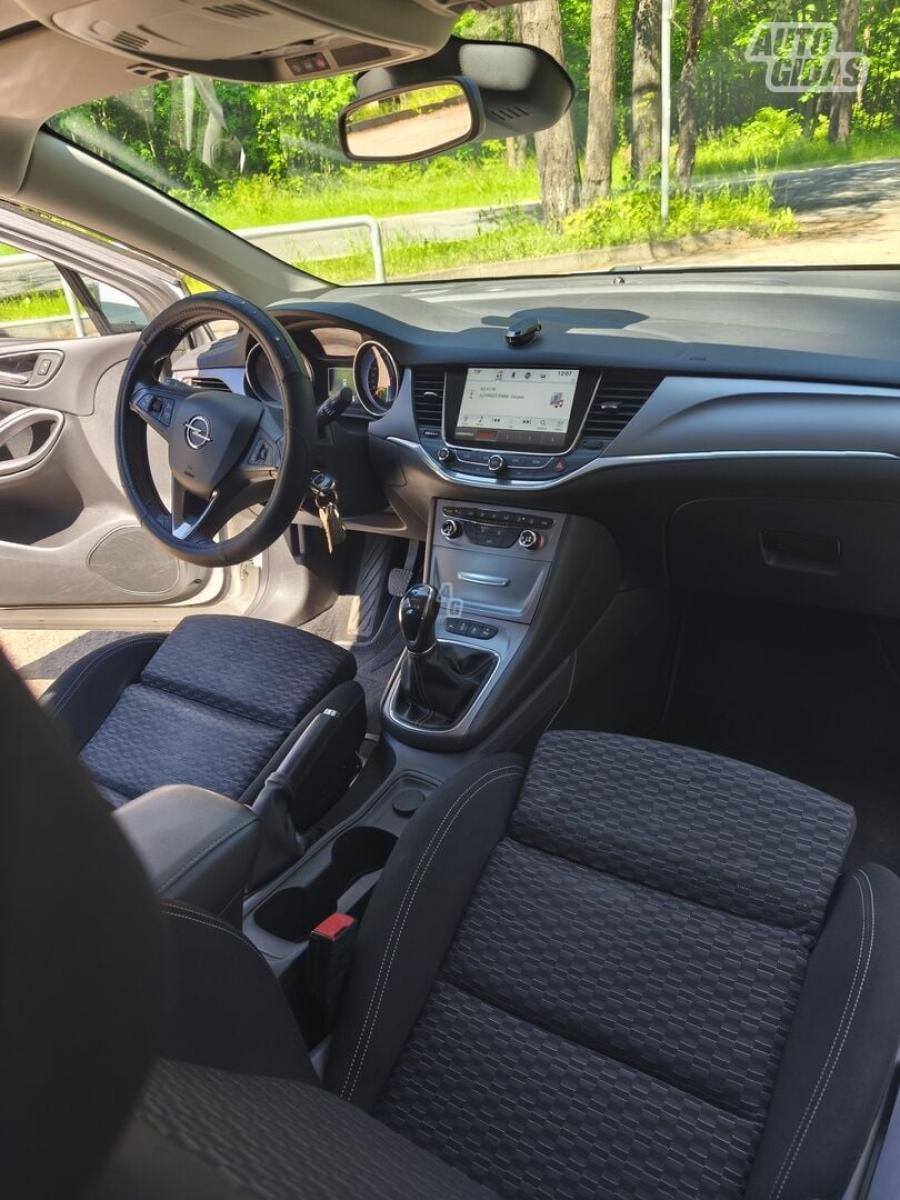 White Opel Astra 2016 in Kaunas, with an engine capacity of 1.60 L and mileage of 255 thousand km for 5800 €, photo 11 on AUTOMOTO.COM.LV