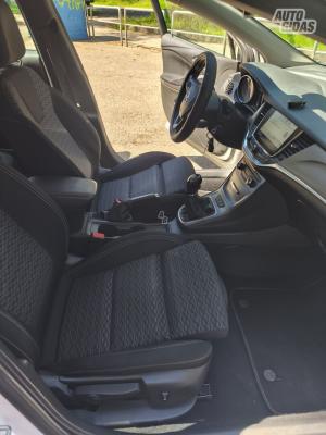 White Opel Astra 2016 in Kaunas, with an engine capacity of 1.60 L and mileage of 255 thousand km for 5500 €, photo 7 on AUTOMOTO.COM.LV