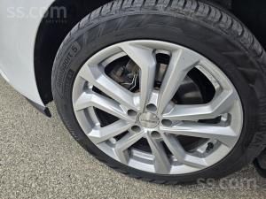 White Opel Astra 2018 in Riga, with an engine capacity of 1.60 L and mileage of 185 thousand km for 7700 €, photo 10 on AUTOMOTO.COM.LV