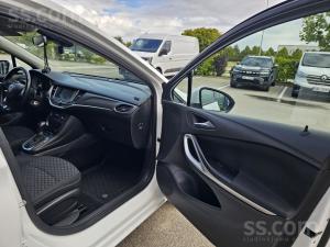 White Opel Astra 2018 in Riga, with an engine capacity of 1.60 L and mileage of 185 thousand km for 7700 €, photo 13 on AUTOMOTO.COM.LV