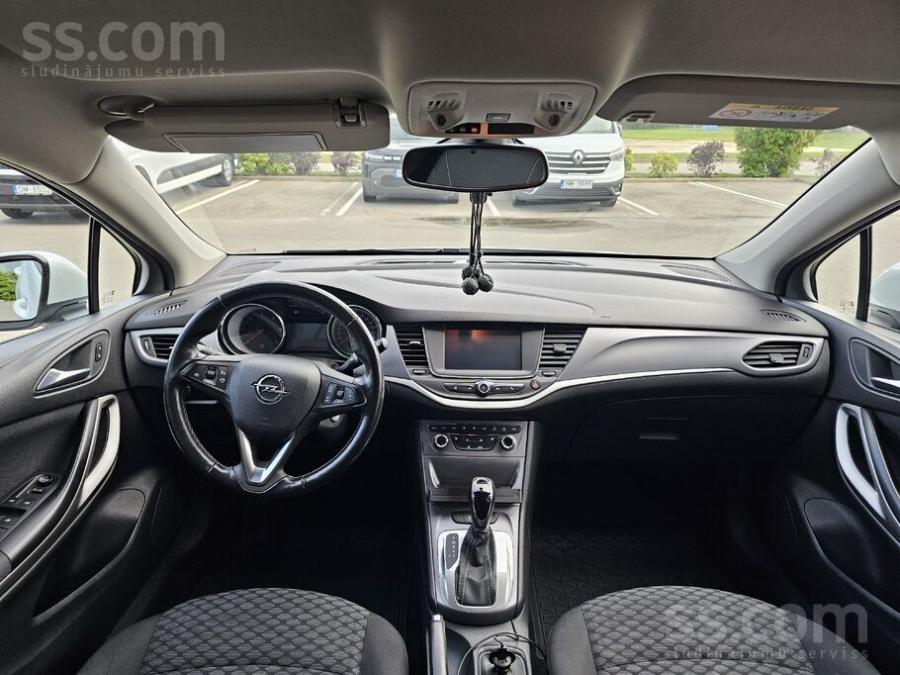 White Opel Astra 2018 in Riga, with an engine capacity of 1.60 L and mileage of 185 thousand km for 7700 €, photo 16 on AUTOMOTO.COM.LV