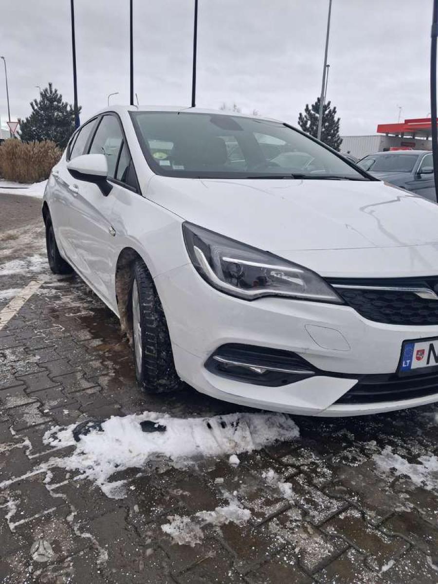 White Opel Astra 2020 in Vilnius, with an engine capacity of 1.50 L and mileage of 254 thousand km for 5800 €, photo 1 on AUTOMOTO.COM.LV
