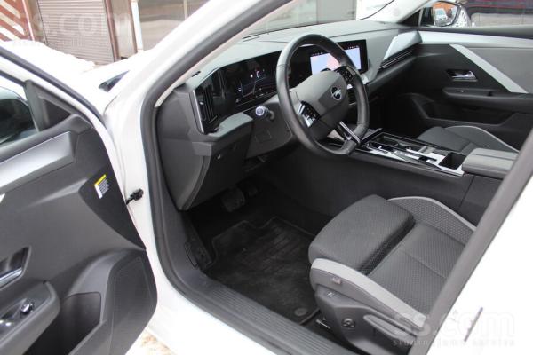 White Opel Astra 2022 in Liepaja, with an engine capacity of 1.50 L and mileage of 131 thousand km for 17299 €, photo 6 on AUTOMOTO.COM.LV