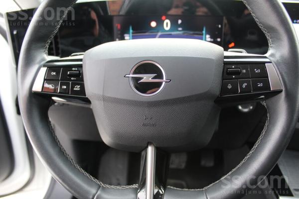 White Opel Astra 2022 in Liepaja, with an engine capacity of 1.50 L and mileage of 131 thousand km for 17299 €, photo 10 on AUTOMOTO.COM.LV