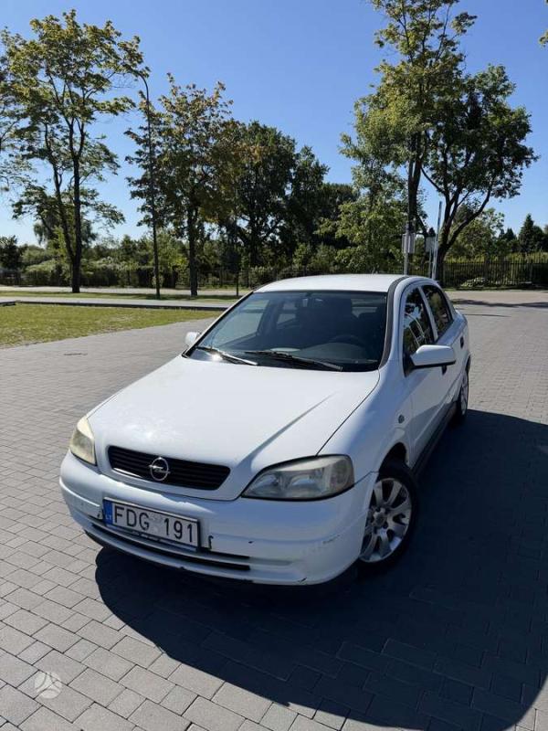 Opel Astra 2001 in Kaunas on AUTOMOTO.COM.LV White Opel Astra 2001 in Kaunas, with an engine capacity of 2.00 L and mileage of 210 thousand km for 660 β¬, photo 1 on AUTOMOTO.COM.LV