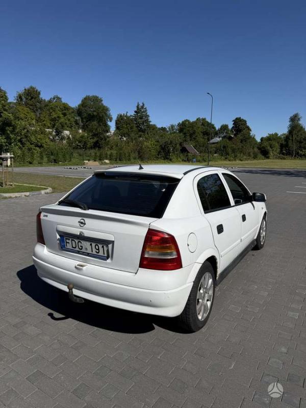 Opel Astra 2001 in Kaunas on AUTOMOTO.COM.LV White Opel Astra 2001 in Kaunas, with an engine capacity of 2.00 L and mileage of 210 thousand km for 660 β¬, photo 8 on AUTOMOTO.COM.LV