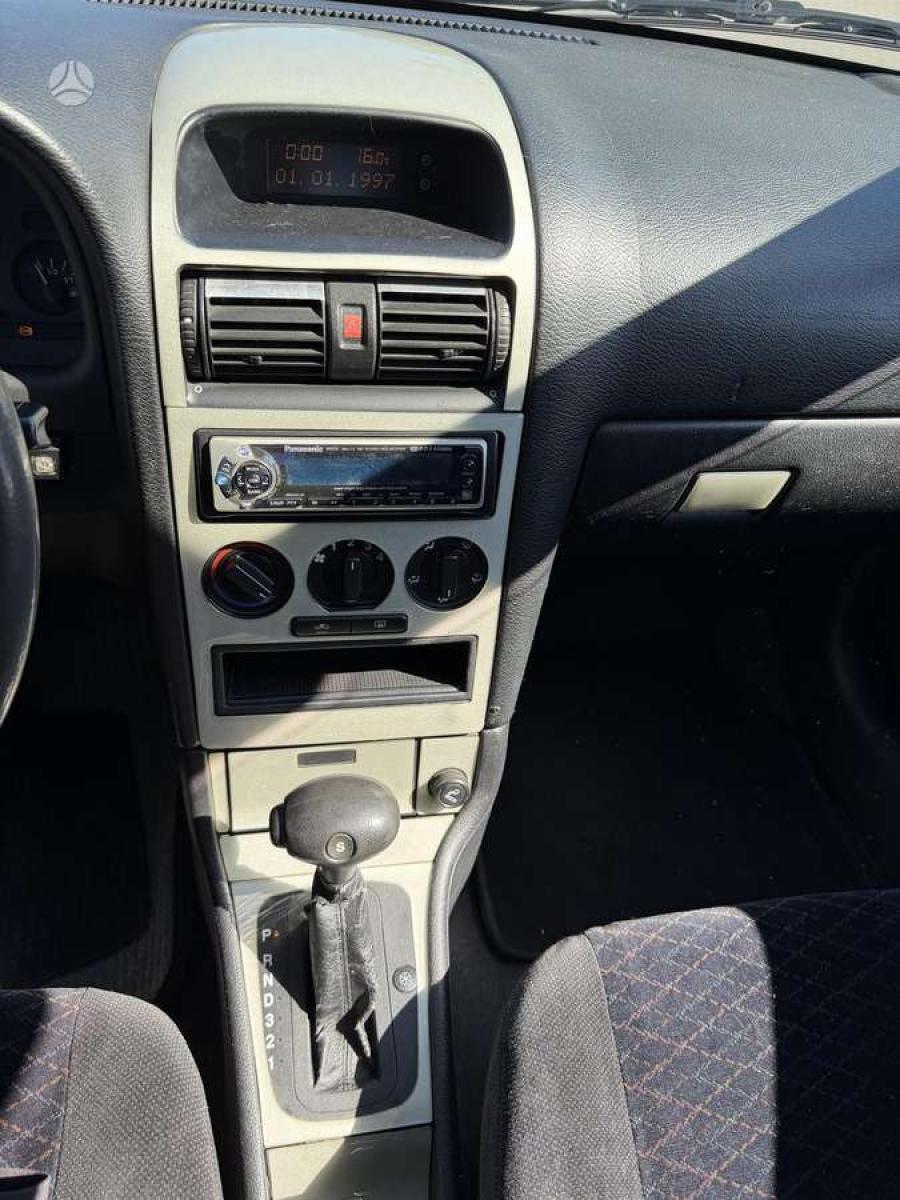 White Opel Astra 2001 in Kaunas, with an engine capacity of 2.00 L and mileage of 210 thousand km for 660 €, photo 16 on AUTOMOTO.COM.LV