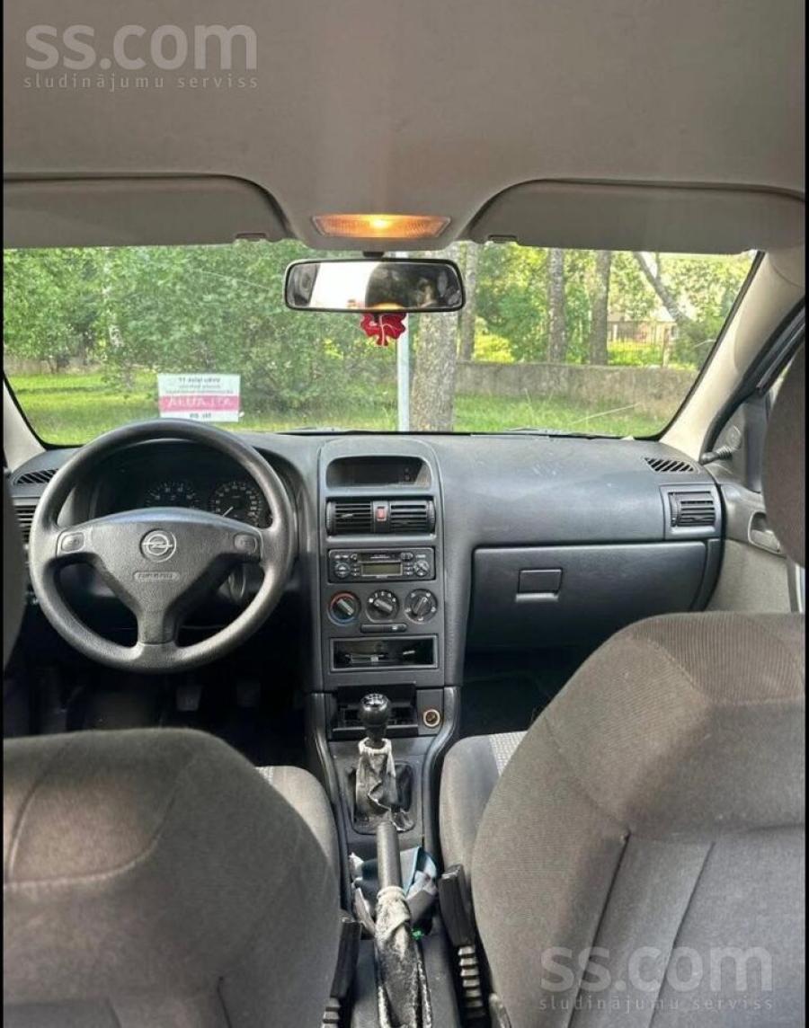 Balts Opel Astra 2005 Rīga, ar dzinēja tilpumu 1.40 L un nobraukumu 141 tūkst. km par 400 €, foto 7 vietnē AUTOMOTO.COM.LV