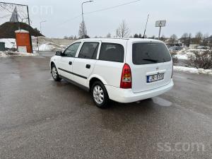 White Opel Astra 2003 in Jelgava, with an engine capacity of 1.70 L and mileage of 300 thousand km for 995 €, photo 8 on AUTOMOTO.COM.LV