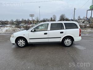 White Opel Astra 2003 in Jelgava, with an engine capacity of 1.70 L and mileage of 300 thousand km for 995 €, photo 9 on AUTOMOTO.COM.LV