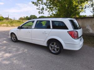 White Opel Astra 2005 in Kaunas, with an engine capacity of 1.70 L and mileage of 315 thousand km for 1000 €, photo 8 on AUTOMOTO.COM.LV