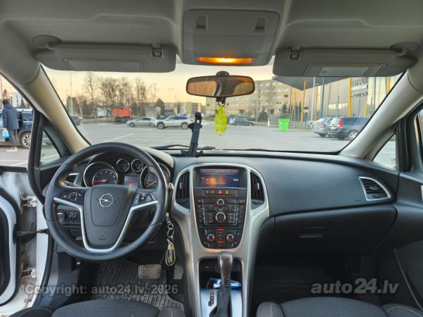 White Opel Astra 2011 in Keila, with an engine capacity of 1.60 L and mileage of 182 thousand km for 4700 €, photo 11 on AUTOMOTO.COM.LV