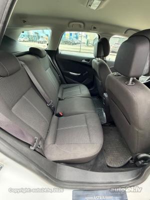 White Opel Astra 2011 in Tallinn, with an engine capacity of 1.60 L and mileage of 182 thousand km for 3499 €, photo 6 on AUTOMOTO.COM.LV