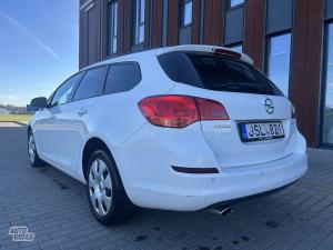 White Opel Astra 2011 in Kaunas, with an engine capacity of 2.00 L and mileage of 302 thousand km for 1890 €, photo 5 on AUTOMOTO.COM.LV