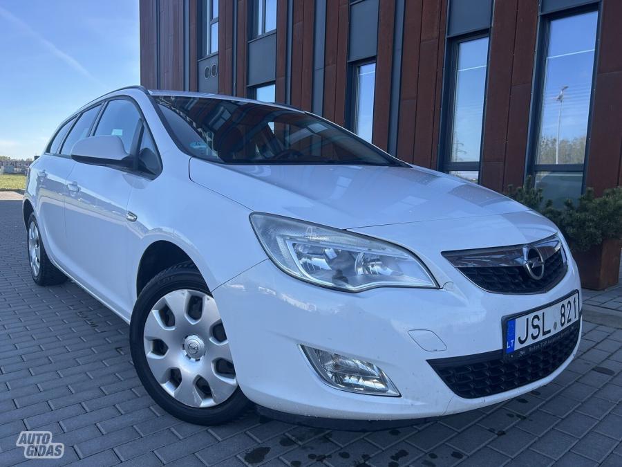 White Opel Astra 2011 in Kaunas, with an engine capacity of 2.00 L and mileage of 302 thousand km for 1890 €, photo 7 on AUTOMOTO.COM.LV