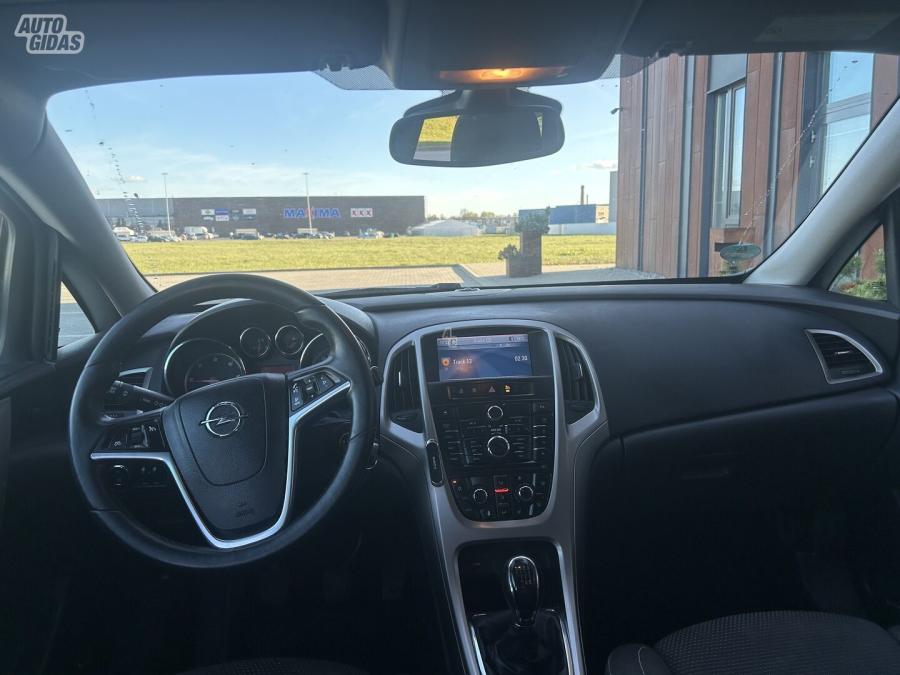 White Opel Astra 2011 in Kaunas, with an engine capacity of 2.00 L and mileage of 302 thousand km for 1890 €, photo 11 on AUTOMOTO.COM.LV