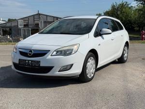 White Opel Astra 2011 in Alytus, with an engine capacity of 1.40 L and mileage of 180 thousand km for 2599 €, photo 5 on AUTOMOTO.COM.LV