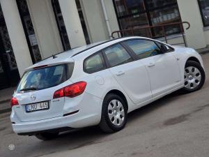 White Opel Astra 2012 in Radviliskis, with an engine capacity of 1.69 L and mileage of 285 thousand km for 2250 €, photo 12 on AUTOMOTO.COM.LV