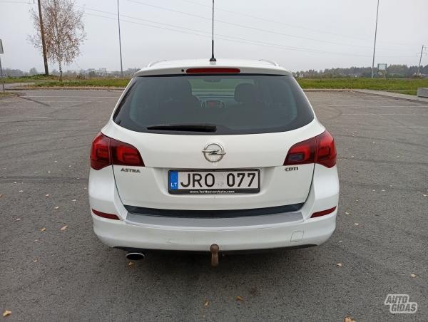 White Opel Astra 2012 in Vilnius, with an engine capacity of 2.00 L and mileage of 430 thousand km for 1550 €, photo 7 on AUTOMOTO.COM.LV