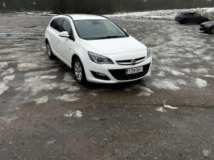 White Opel Astra 2014 in Kaunas, with an engine capacity of 1.60 L and mileage of 318 thousand km for 3900 €, photo 2 on AUTOMOTO.COM.LV