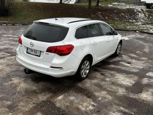 White Opel Astra 2014 in Kaunas, with an engine capacity of 1.60 L and mileage of 318 thousand km for 3900 €, photo 4 on AUTOMOTO.COM.LV