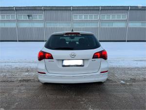 White Opel Astra 2014 in Taurage, with an engine capacity of 1.60 L and mileage of 222 thousand km for 3700 €, photo 4 on AUTOMOTO.COM.LV