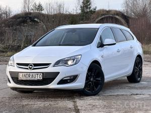 White Opel Astra 2014 in Tukums, with an engine capacity of 2.00 L and mileage of 261 thousand km for 4890 €, photo 3 on AUTOMOTO.COM.LV