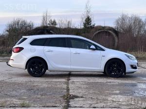 White Opel Astra 2014 in Tukums, with an engine capacity of 2.00 L and mileage of 261 thousand km for 4890 €, photo 8 on AUTOMOTO.COM.LV