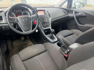 White Opel Astra 2014 in Kaunas, with an engine capacity of 1.60 L and mileage of 265 thousand km for 2550 €, photo 7 on AUTOMOTO.COM.LV