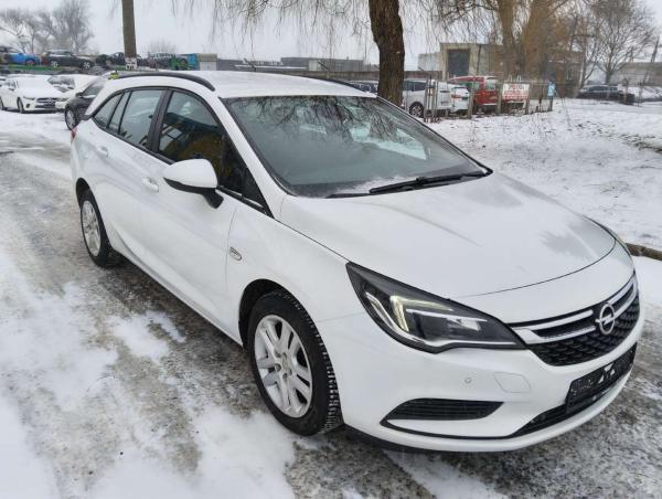 White Opel Astra 2016 in Marijampole, with an engine capacity of 1.60 L and mileage of 194 thousand km for 6000 €, photo 2 on AUTOMOTO.COM.LV