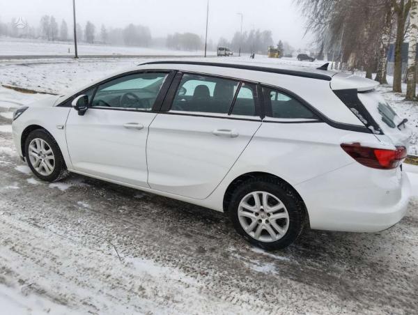 White Opel Astra 2016 in Marijampole, with an engine capacity of 1.60 L and mileage of 194 thousand km for 6000 €, photo 3 on AUTOMOTO.COM.LV