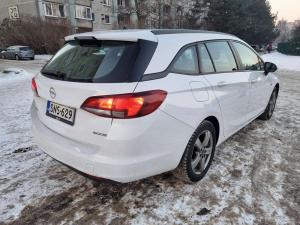 White Opel Astra 2016 in Kaunas, with an engine capacity of 1.00 L and mileage of 207 thousand km for 5850 €, photo 5 on AUTOMOTO.COM.LV