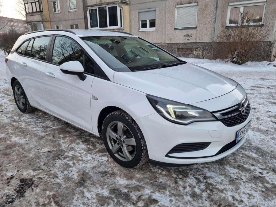White Opel Astra 2016 in Kaunas, with an engine capacity of 1.00 L and mileage of 207 thousand km for 5850 €, photo 7 on AUTOMOTO.COM.LV