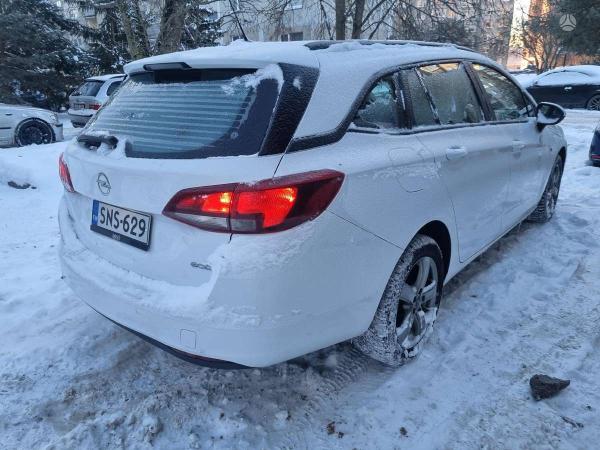 White Opel Astra 2016 in Kaunas, with an engine capacity of 1.00 L and mileage of 207 thousand km for 5500 €, photo 3 on AUTOMOTO.COM.LV
