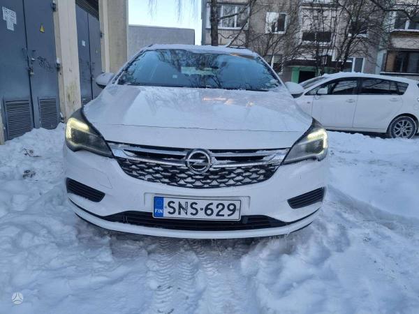 White Opel Astra 2016 in Kaunas, with an engine capacity of 1.00 L and mileage of 207 thousand km for 5500 €, photo 6 on AUTOMOTO.COM.LV