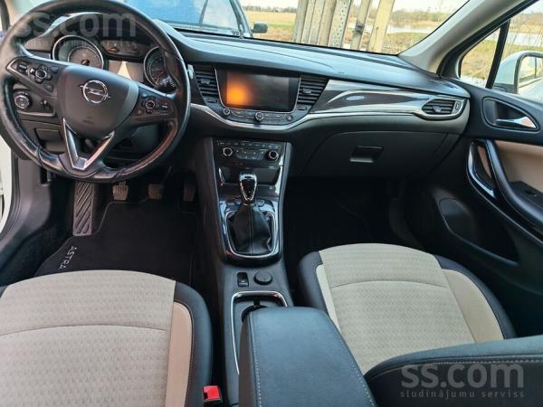 White Opel Astra 2016 in Riga, with an engine capacity of 1.60 L and mileage of 205 thousand km for 5200 €, photo 8 on AUTOMOTO.COM.LV
