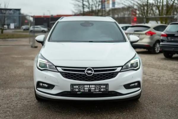 White Opel Astra 2016 in Liepaja, with an engine capacity of 1.60 L and mileage of 176 thousand km for 9350 €, photo 6 on AUTOMOTO.COM.LV